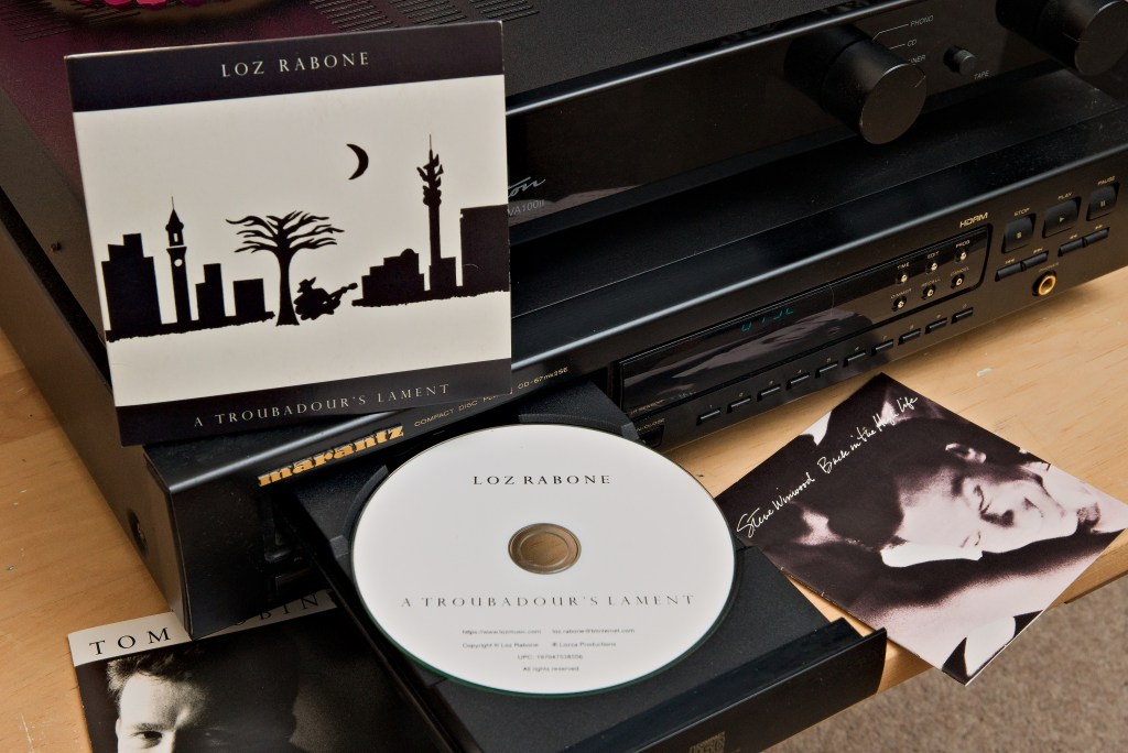 Loz Rabone - A Troubador's Lament: Album Review : At The Barrier